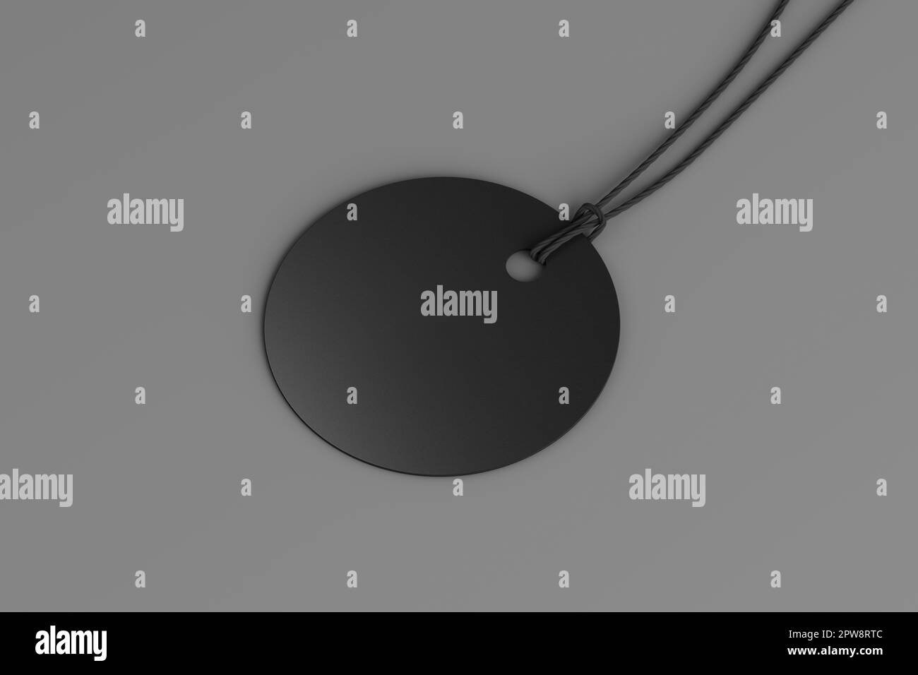 Black round tag mockup on gray background. Side view Stock Photo - Alamy