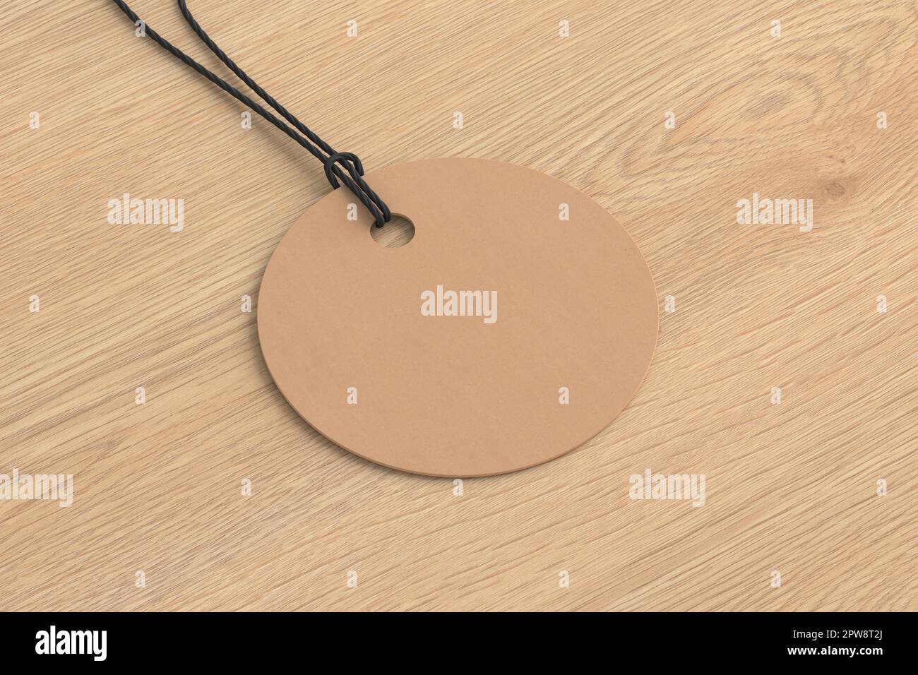 Cardboard round tag mockup on wooden background. Side view Stock Photo ...
