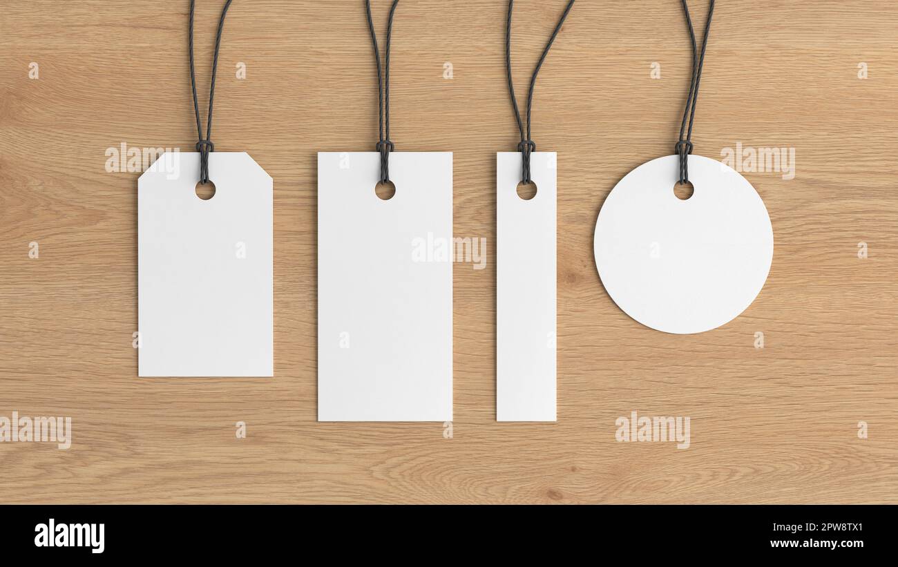 White tags of various shapes mockup on wooden background. View directly ...