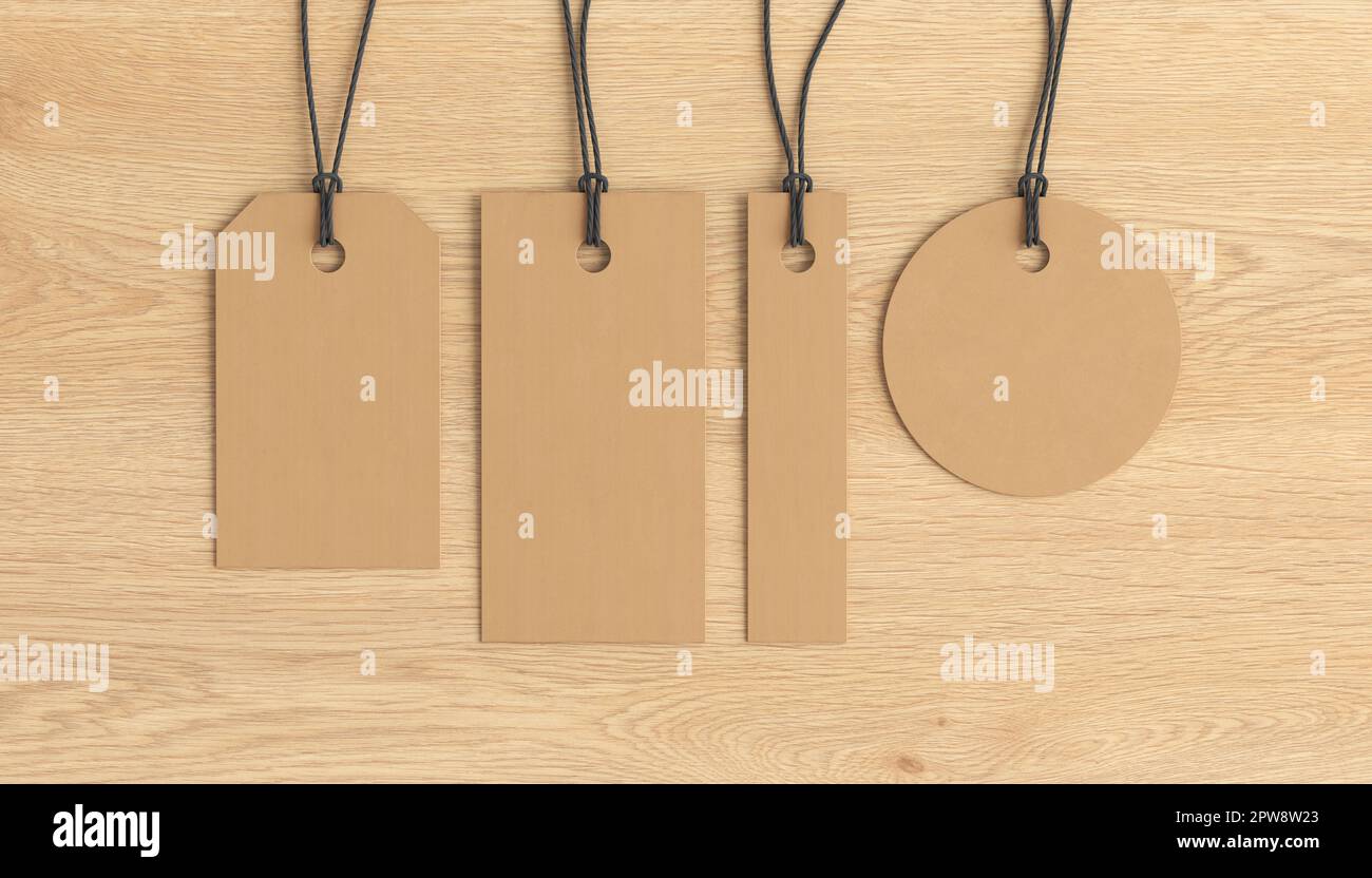 Cardboard tags of various shapes mockup on wooden background. View ...