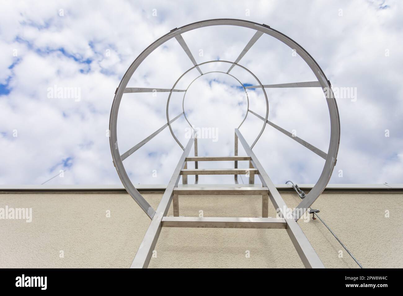 View from below of the technical ladder leading to the building's roof ...