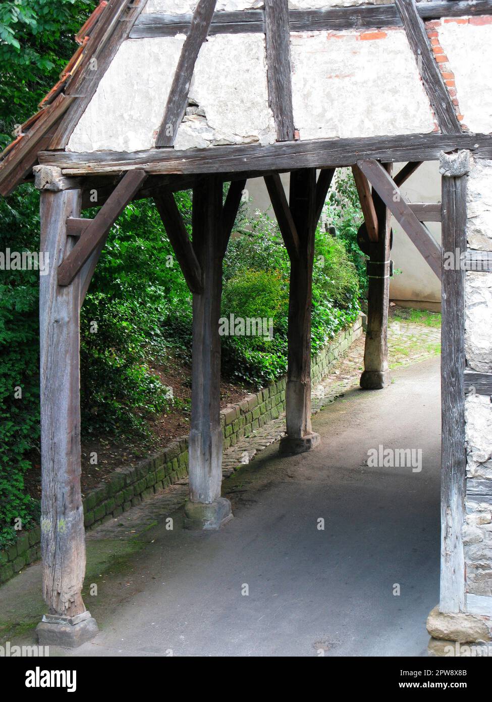 Arcades under a medieval half-timbered building in Waiblingen, Germany ...