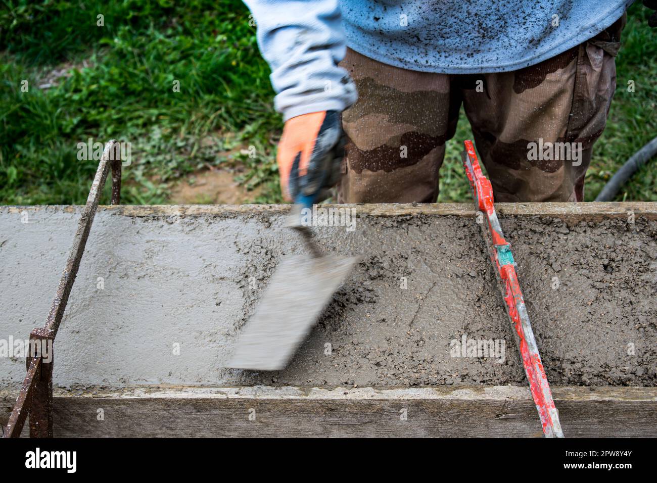 Spreading concrete hi-res stock photography and images - Alamy