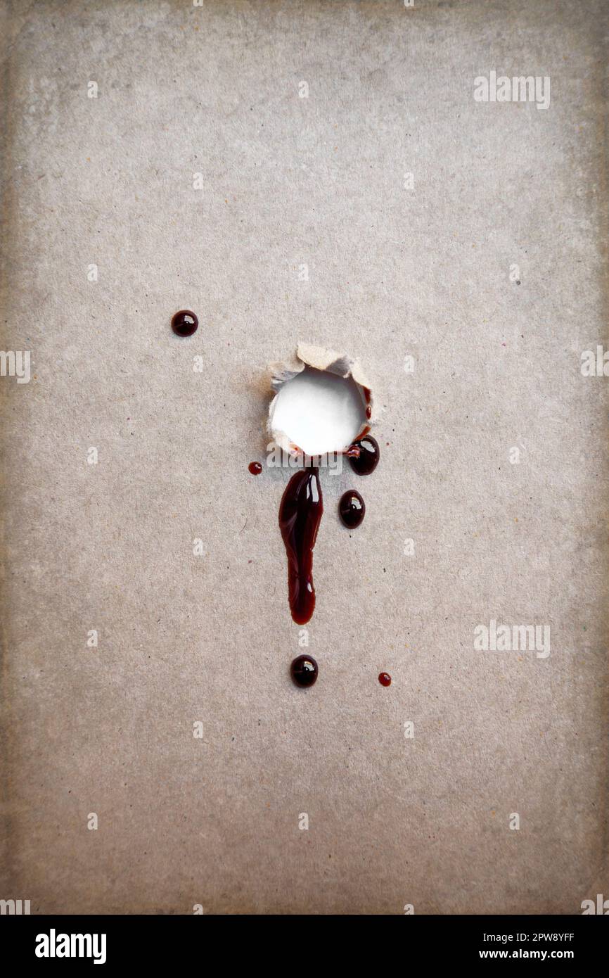 Torn Paper Hole with Blood Stock Photo - Alamy