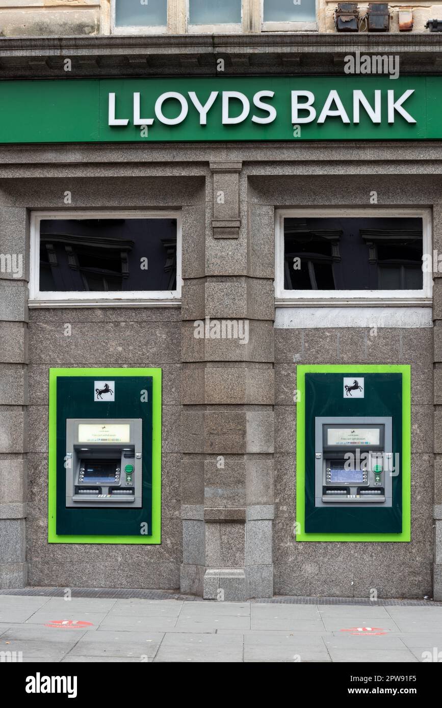 Twin ATM or cash machines outside of a Lloyds bank in Brighton, England ...