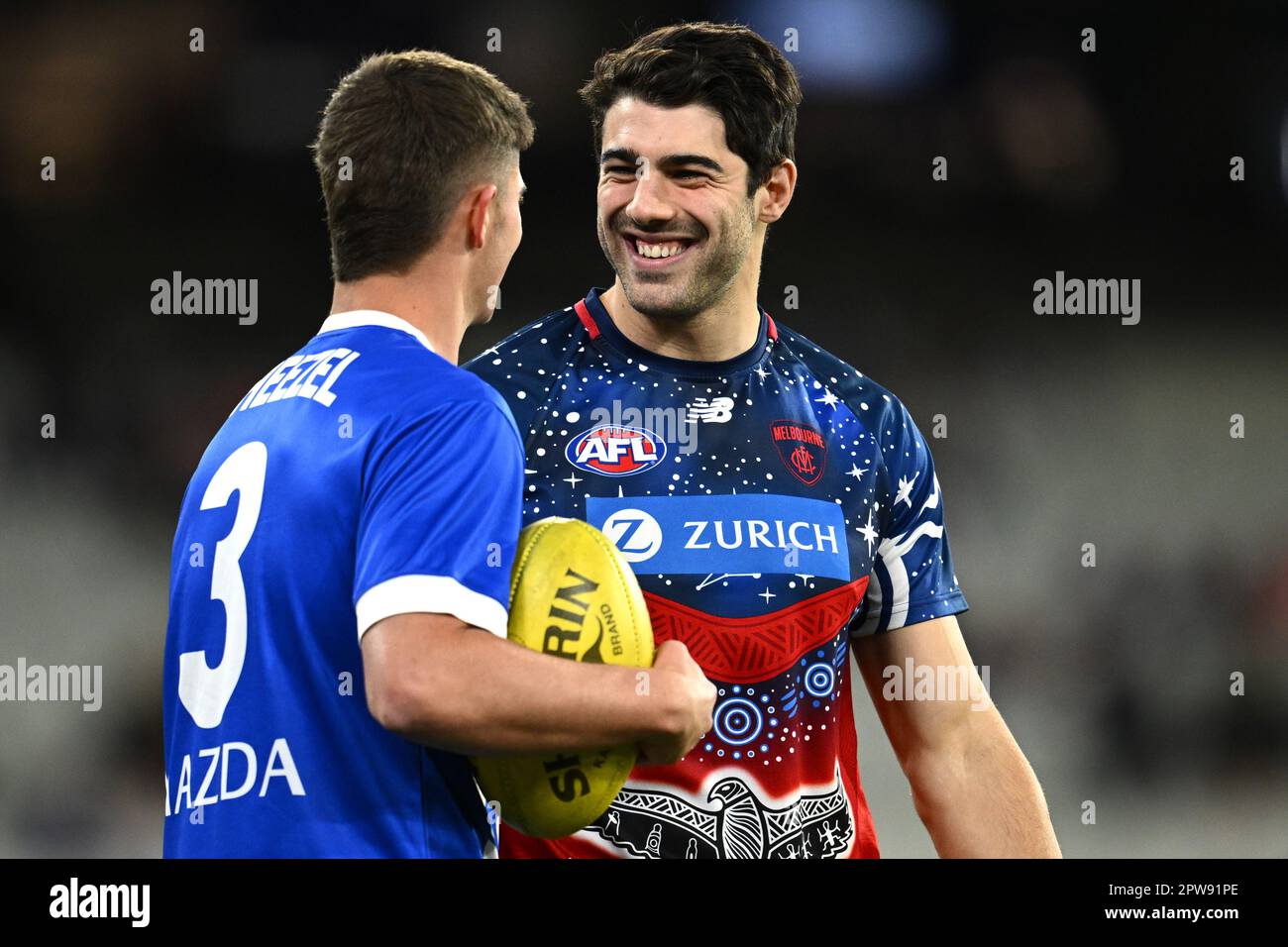 Harry Sheezel of North Melbourne and Christian Petracca of Melbourne ...