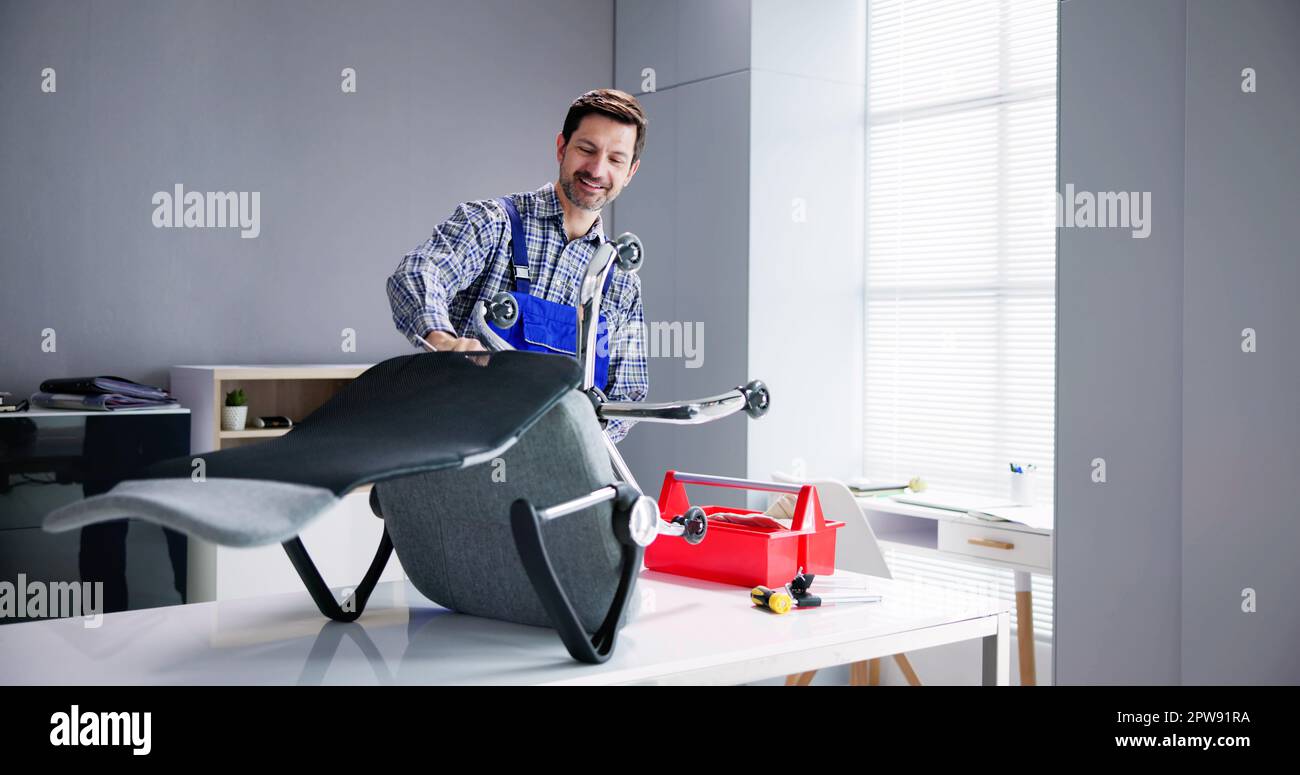 Office Chair Assembling And Repair. Man Working With Tool Stock Photo ...