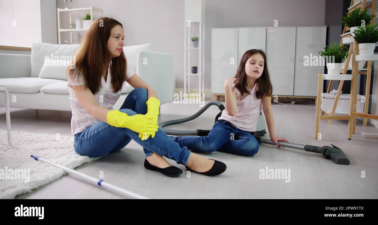 Family Housework Child Fun. Housewife And Girl At Home Stock Photo - Alamy