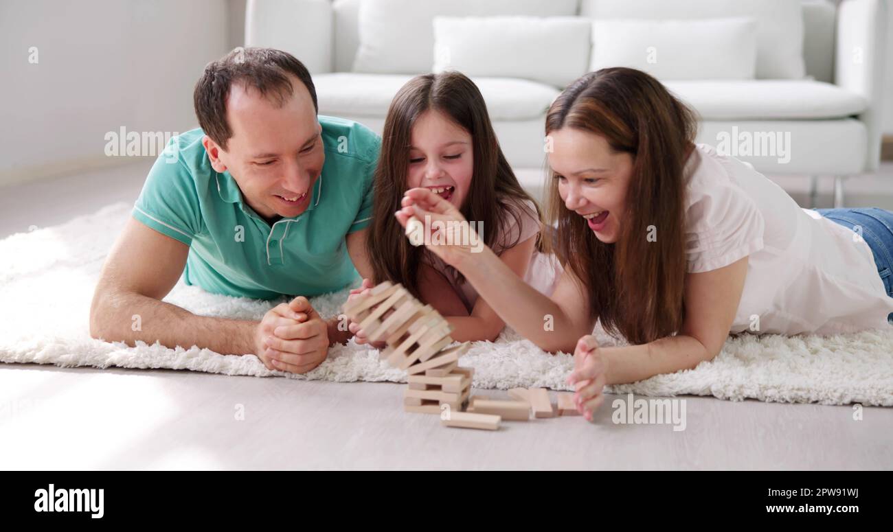 Father children playing blocks hi-res stock photography and images - Alamy