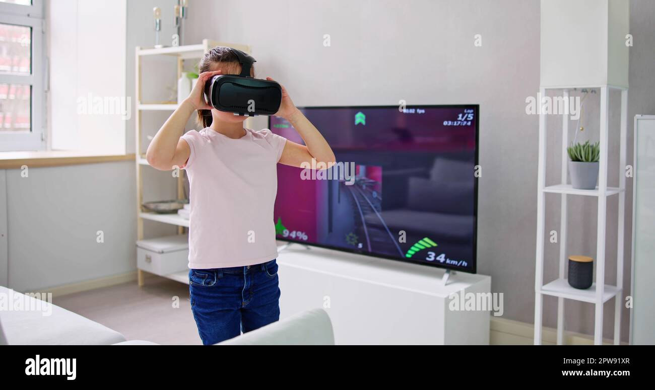 Virtual Reality Kid 3D Video Game With Headset Stock Photo - Alamy