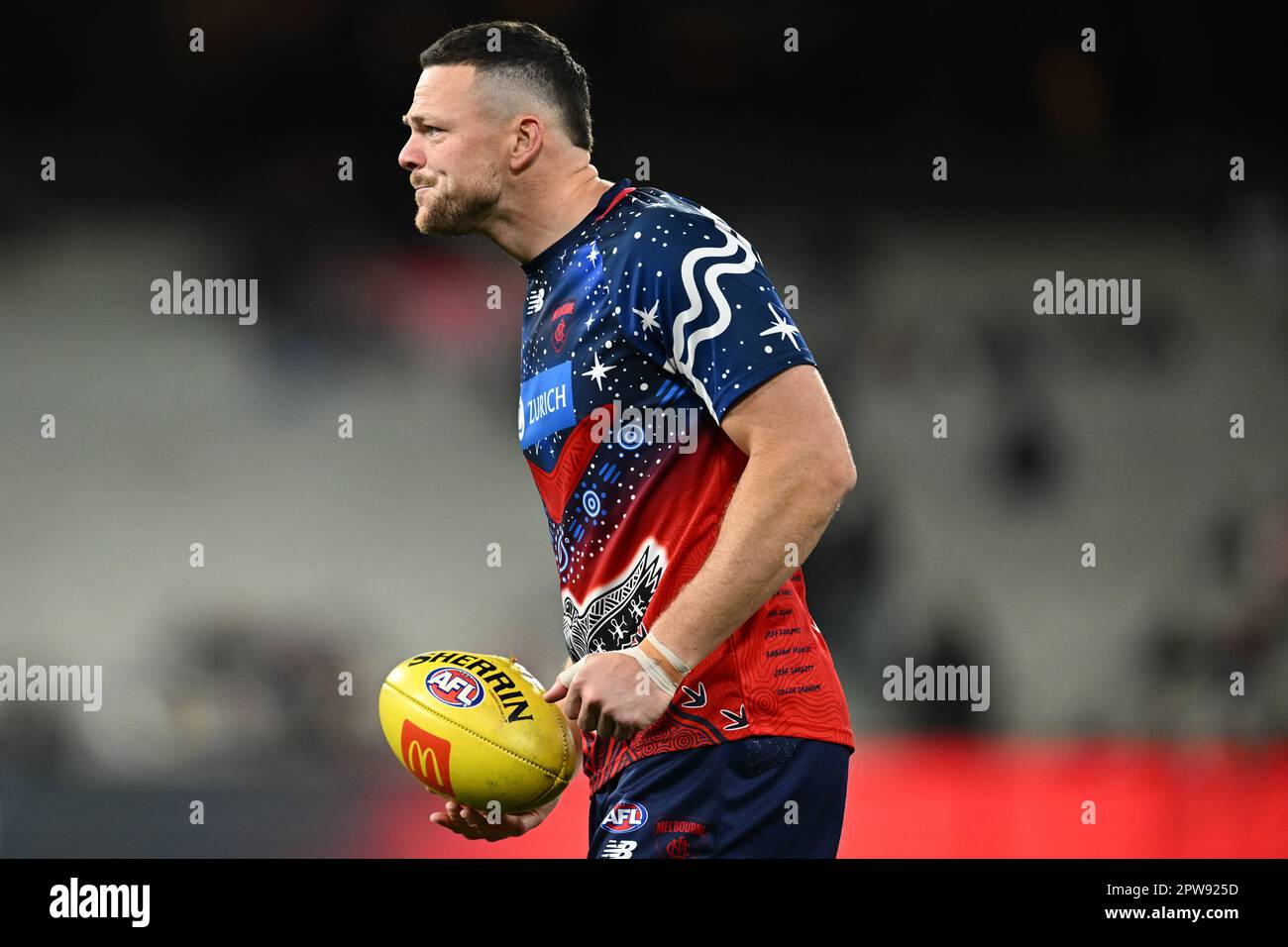 Steven May of Melbourne warms up during the AFL Round 7 match between ...