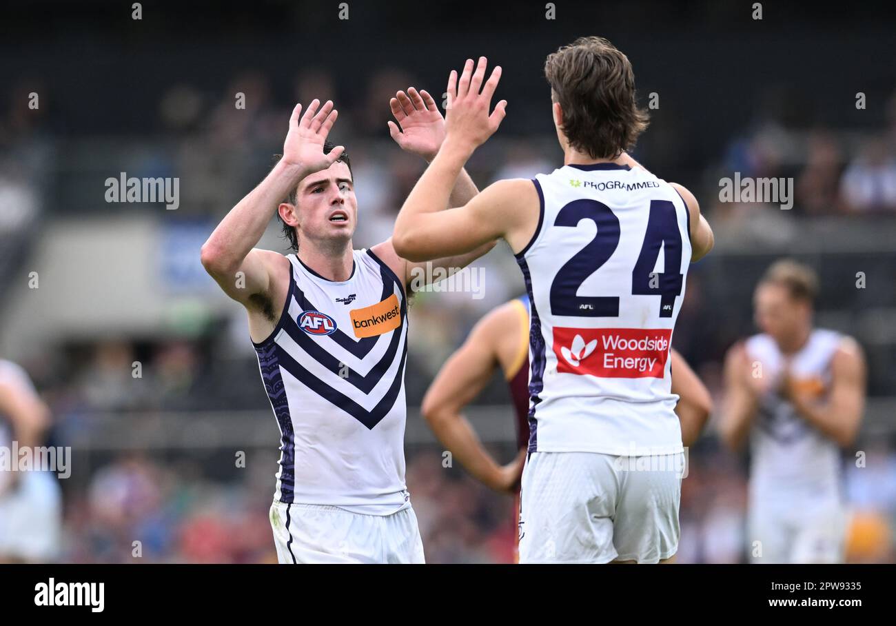 Jye Amiss (right) of the Dockers celebrates kicking a goal with Andrew ...