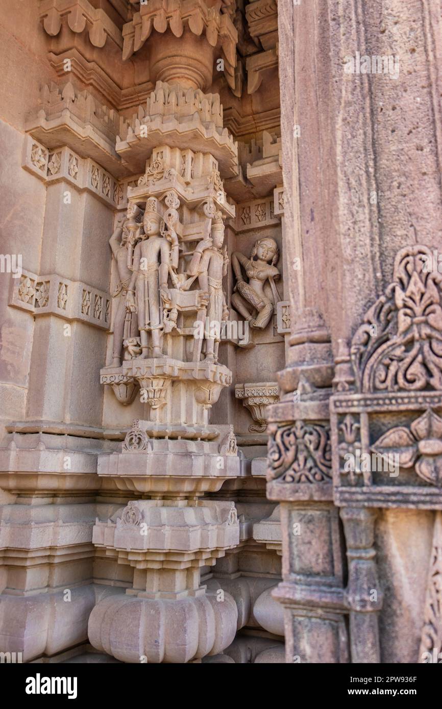 hindu god unique idol engraved art on temple wall from flat angle at ...
