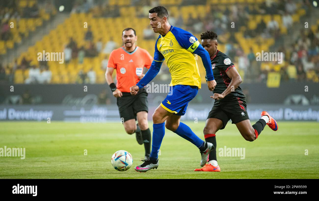 Cristiano Ronaldo of Al-Nassr FC in action against Al-Raed FC during ...