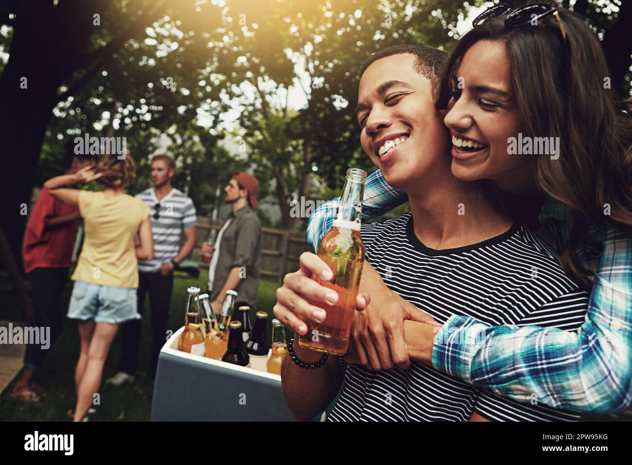 Lets celebrate the weekend together. a young couple enjoying a party ...