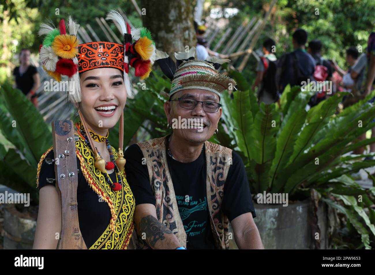 Beautiful Orang Ulu young lady of Sarawak with her music master Stock ...