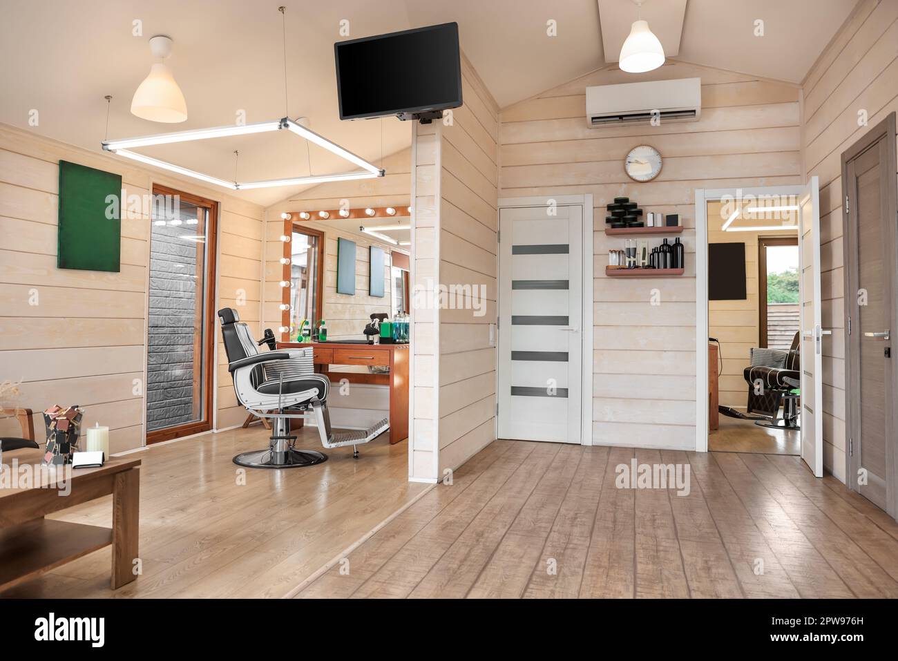 Stylish barbershop interior with professional hairdresser's workplace ...