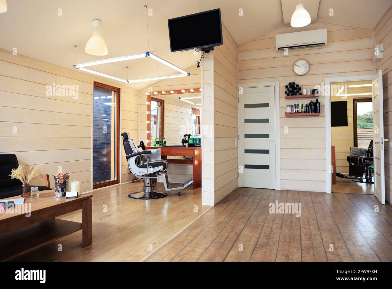 Stylish barbershop interior with professional hairdresser's workplace ...