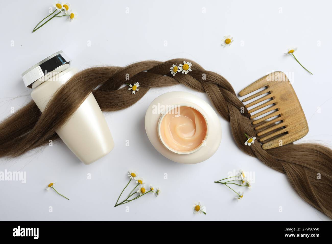 Flat lay composition with natural cosmetic products and hair braid on ...