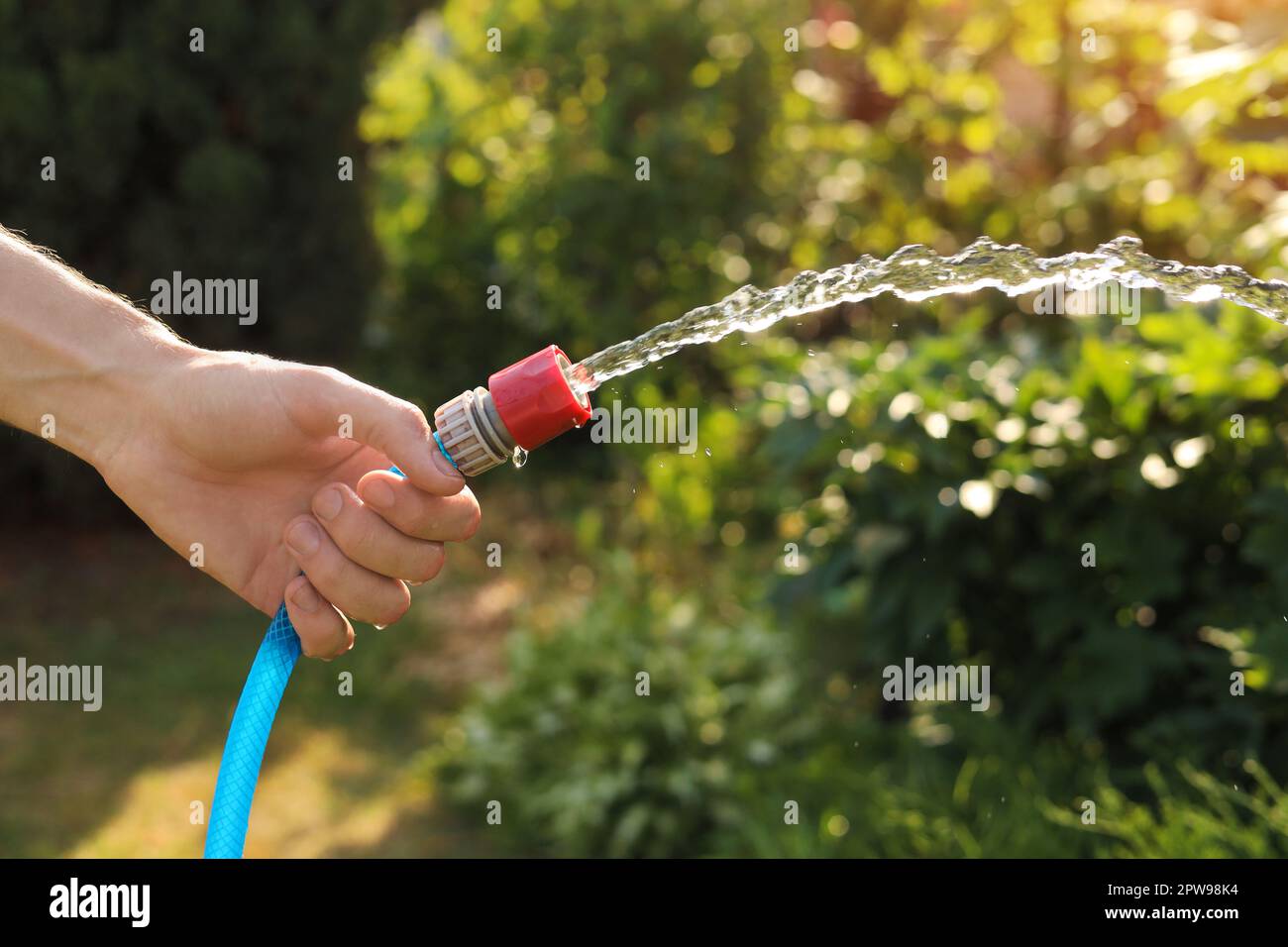 Man pouring water from hi-res stock photography and images - Alamy