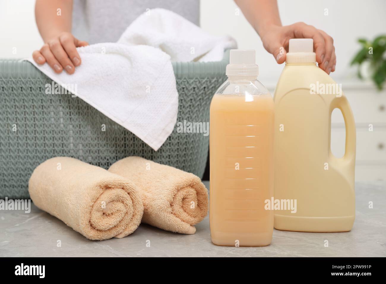 Woman basket clothes detergent table hi-res stock photography and ...
