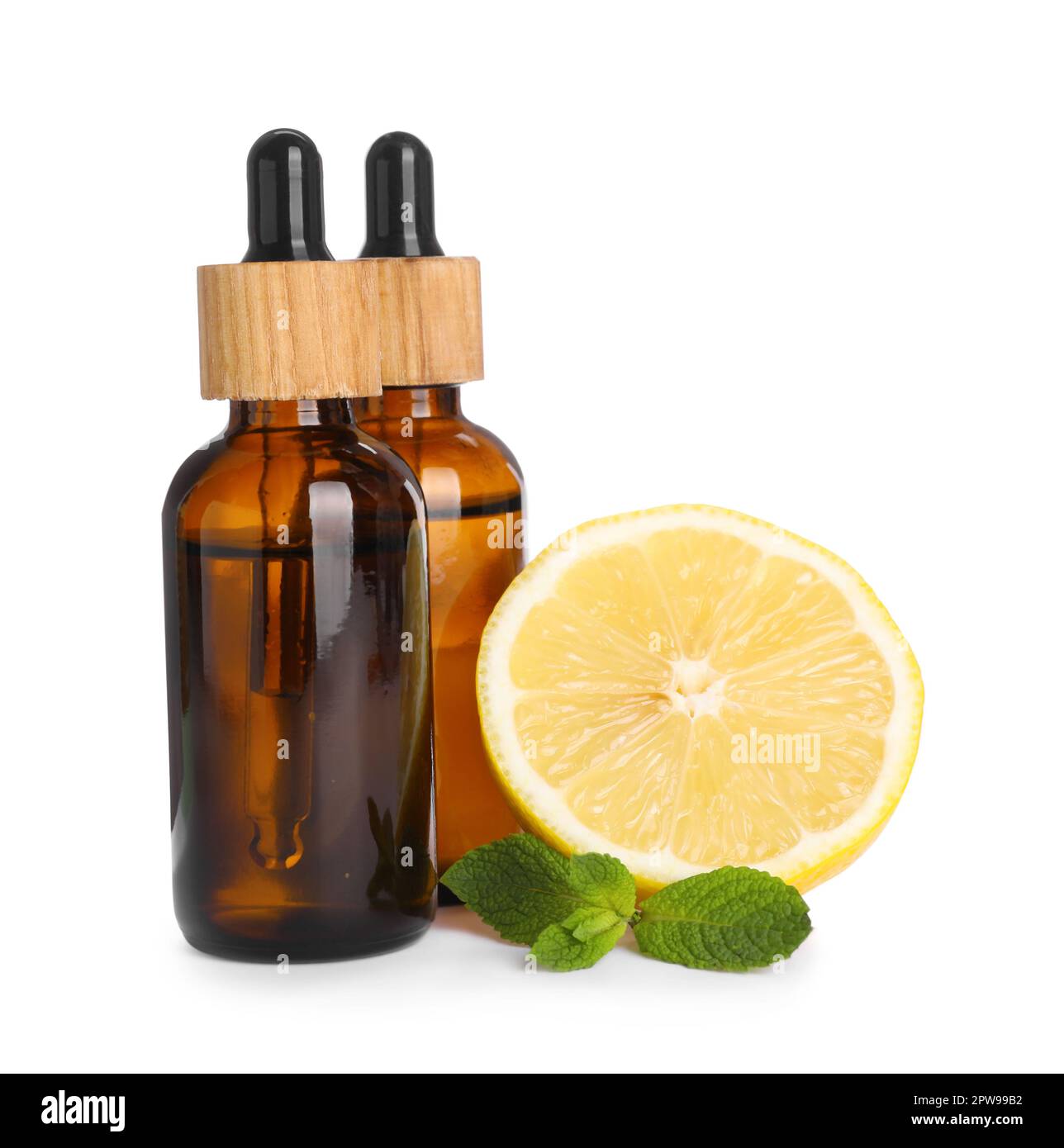 Bottles of citrus essential oil and fresh lemon isolated on white Stock ...