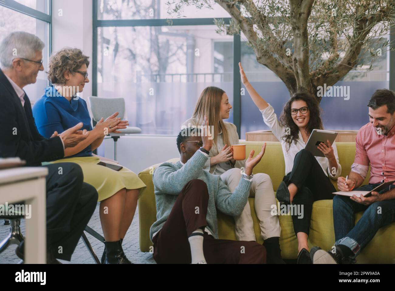 Group of business people did a successful job and are giving an aplause ...