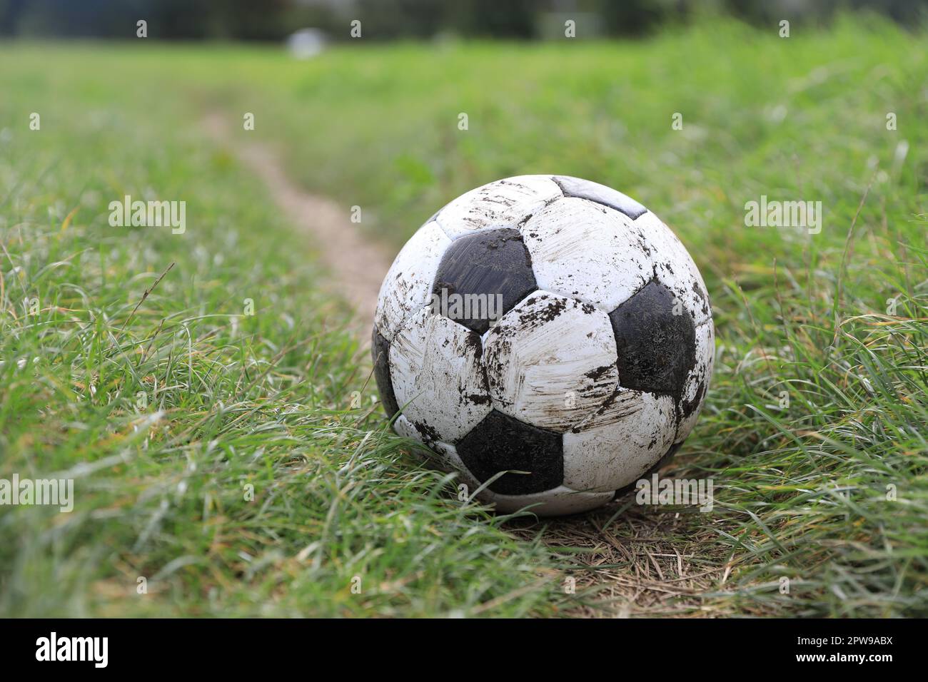 Mud soccer ball hi-res stock photography and images - Alamy