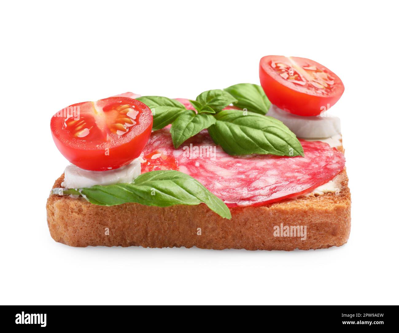Tasty toast with cream cheese, tomato, salami and basil on white ...
