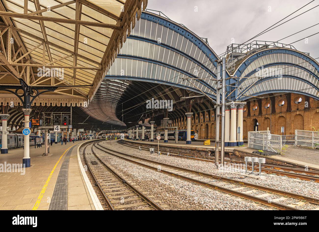 Panorama of a 19th Century built railway station. Two metal and glass ...