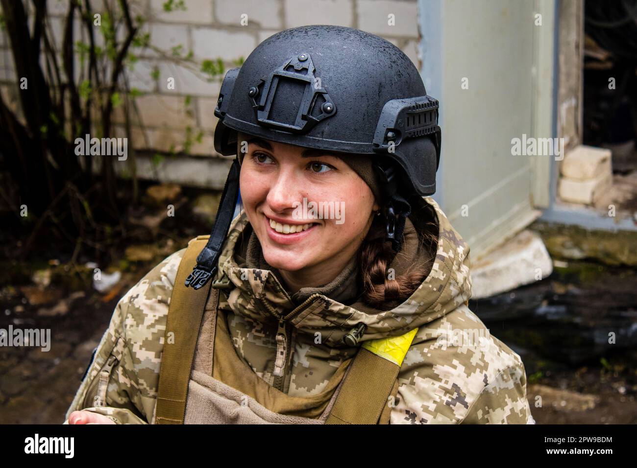 Ukrainian servicewoman work at the position of the artillery brigade at ...