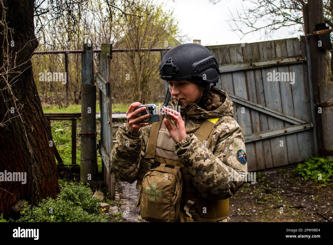 Ukrainian servicewoman work at the position of the artillery brigade at ...