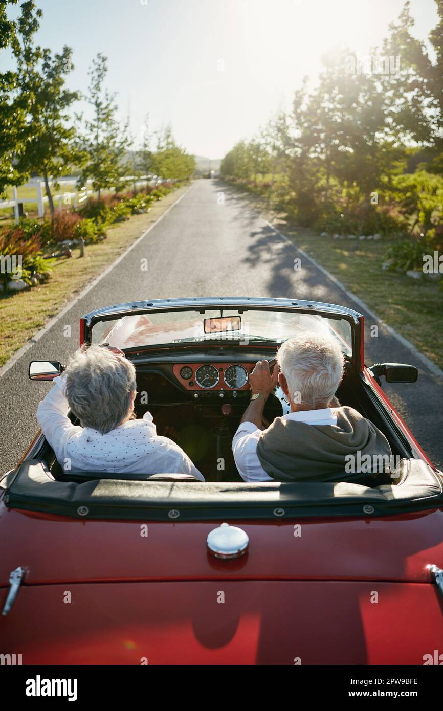 Taking a trip down memory lane. a senior couple going on a road trip ...