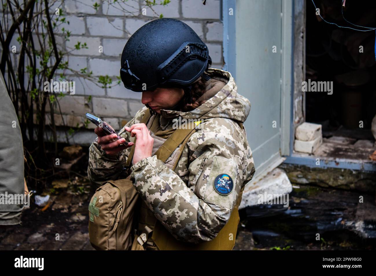 Ukrainian servicewoman work at the position of the artillery brigade at ...