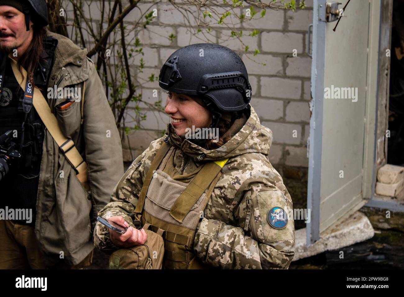 Ukrainian servicewoman work at the position of the artillery brigade at ...