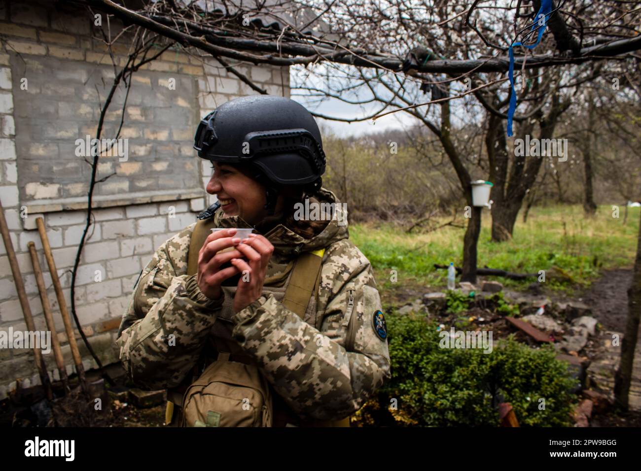 Ukrainian servicewoman work at the position of the artillery brigade at ...