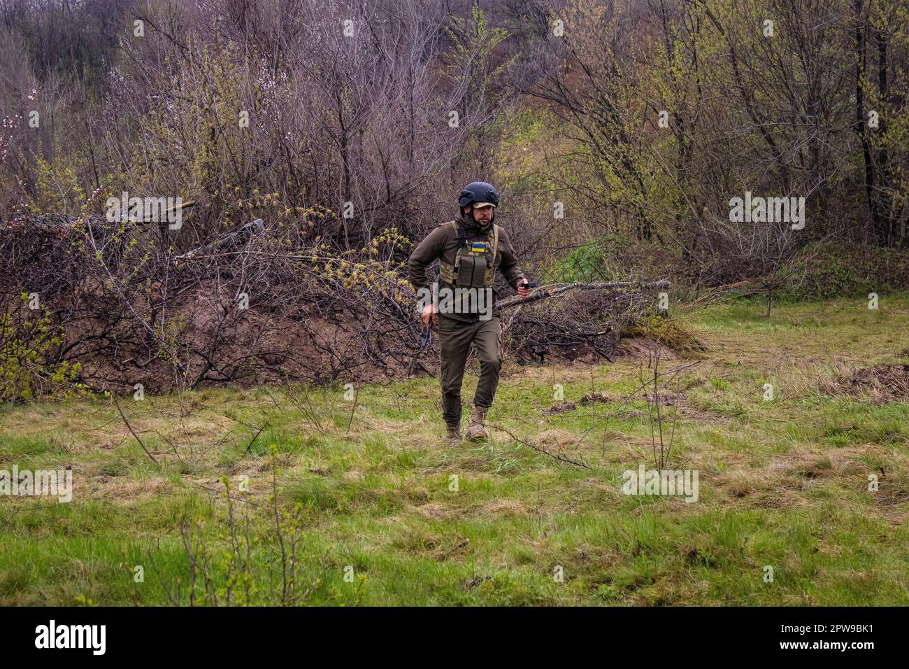 Ukrainian servicemen work at the position of the artillery brigade at ...