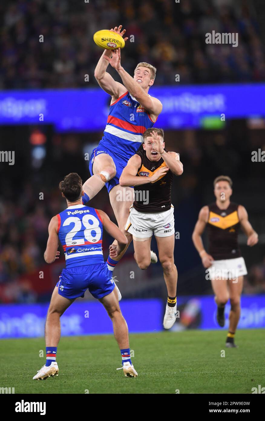 Tim English of the Bulldogs (second from left) is seen in action during ...