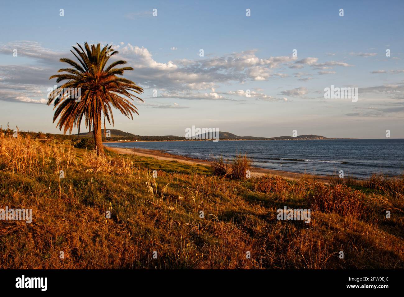 The setting sun in Bella Vista beach in Uruguay Stock Photo - Alamy