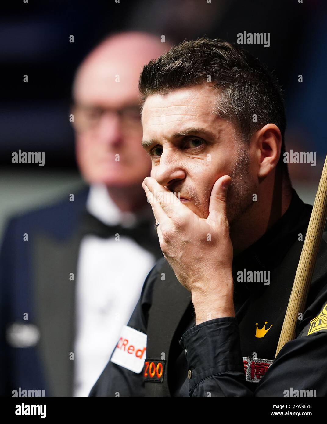Mark Selby in action against Mark Allen (not pictured) on day fifteen ...