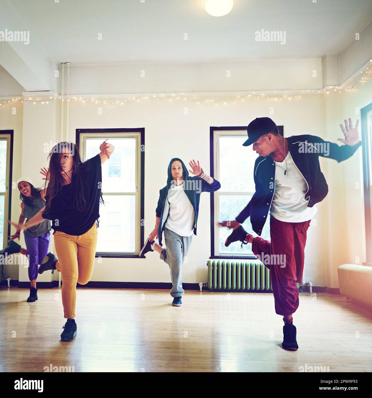 Taking the dance world by storm. a group of young people dancing ...