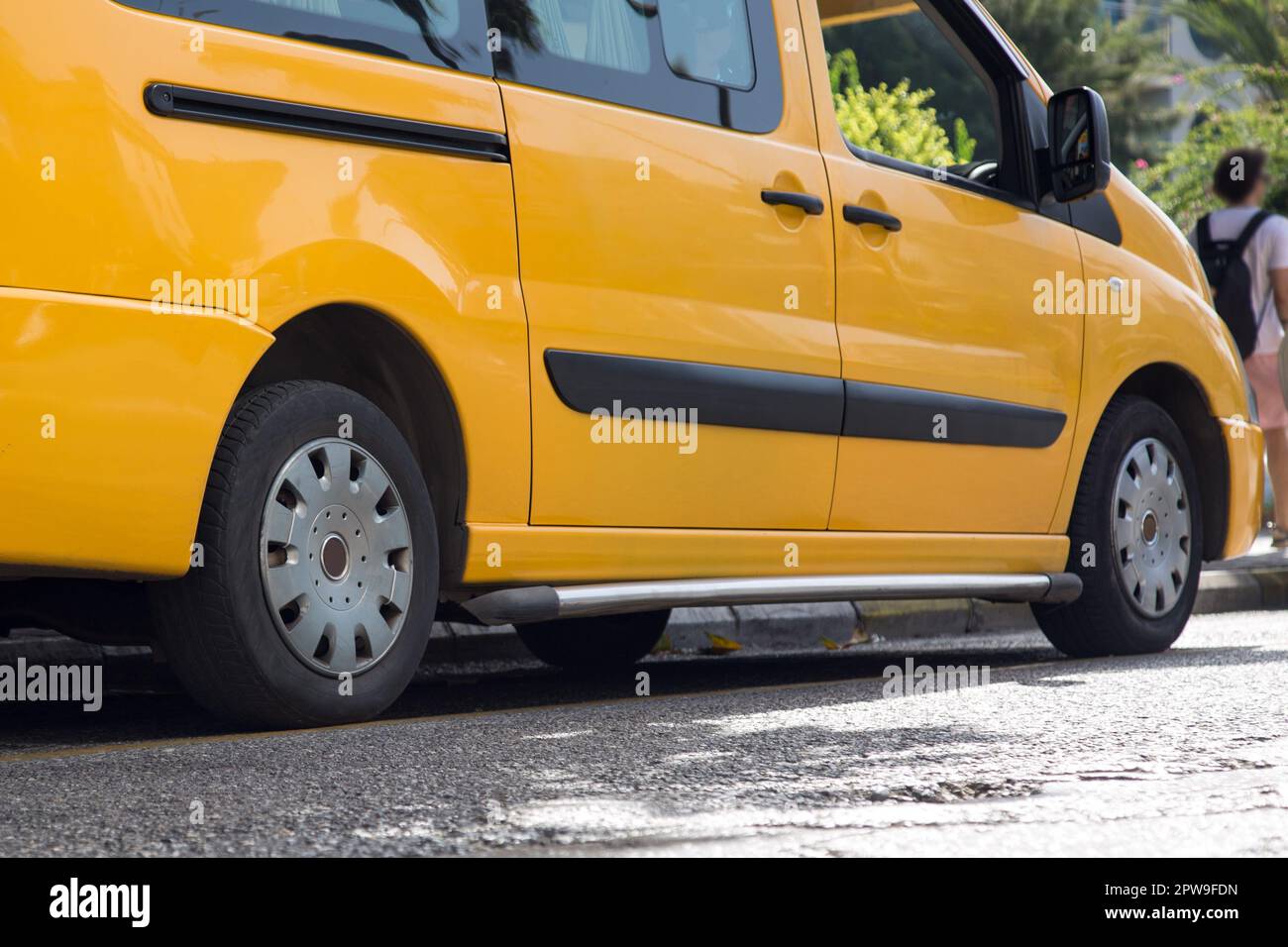 Yellow minibus, taxi bus in the parking lot Stock Photo - Alamy