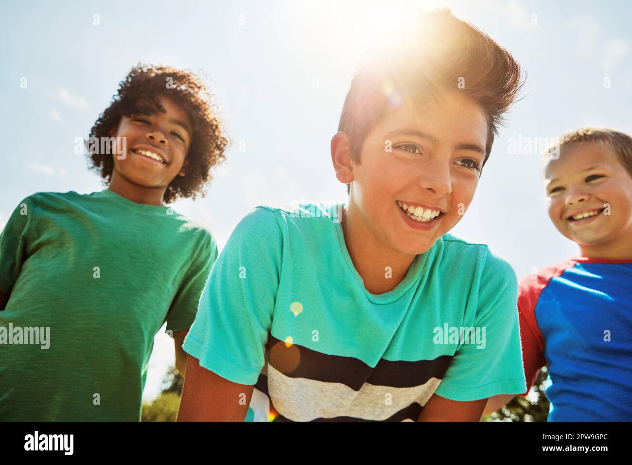 Sharing a summers day with some cool guys. a group of diverse and happy ...