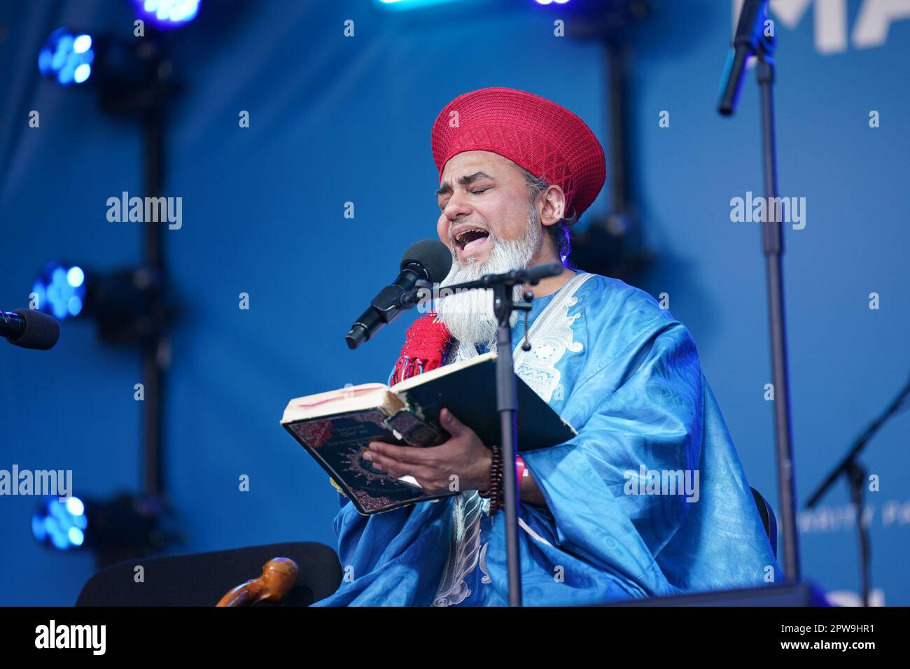 Hassen Rasool sings on stage during the Eid in the Square festival in ...