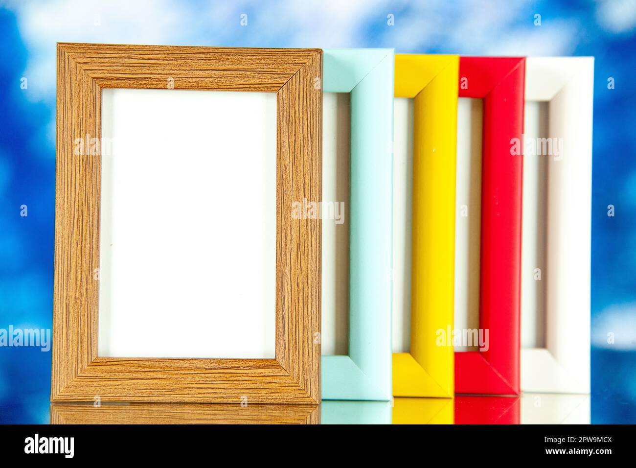 front view different picture frames with colored corners on a light ...