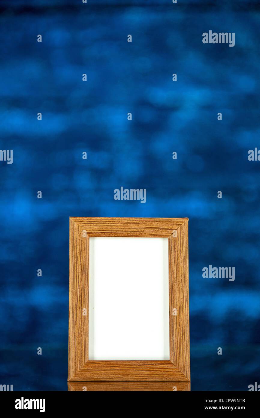 front view picture frame on blue background color shoot present photo ...