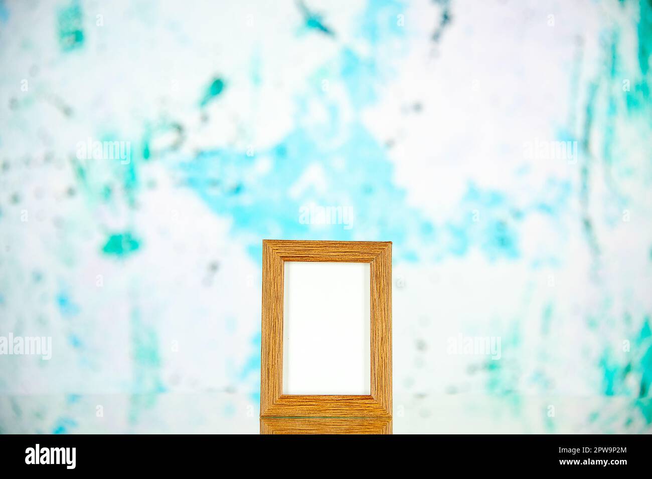 front view picture frame on light blue background portrait photo color ...