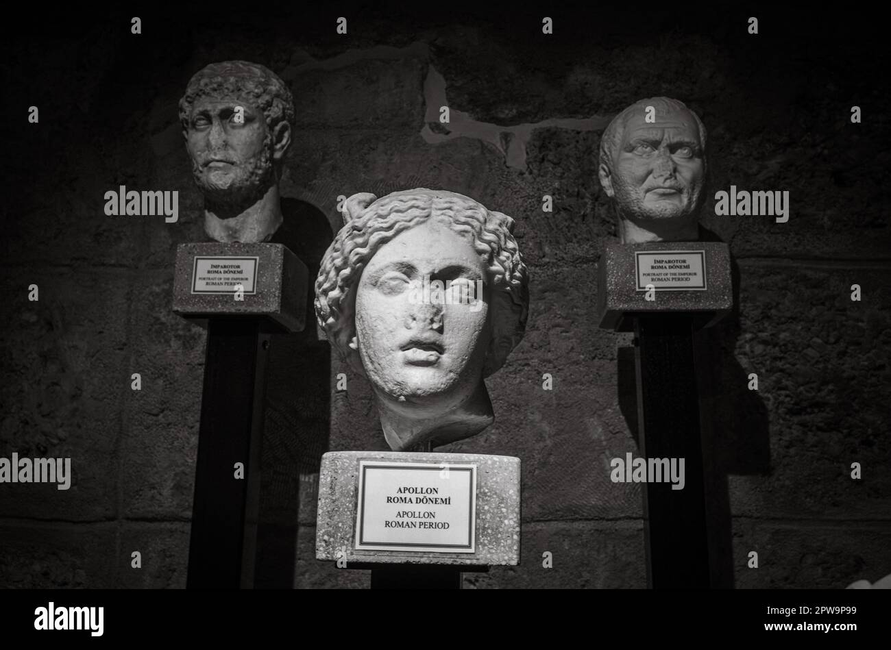 Three carved stone marble Roman heads dating from 2nd - 4th century AD ...