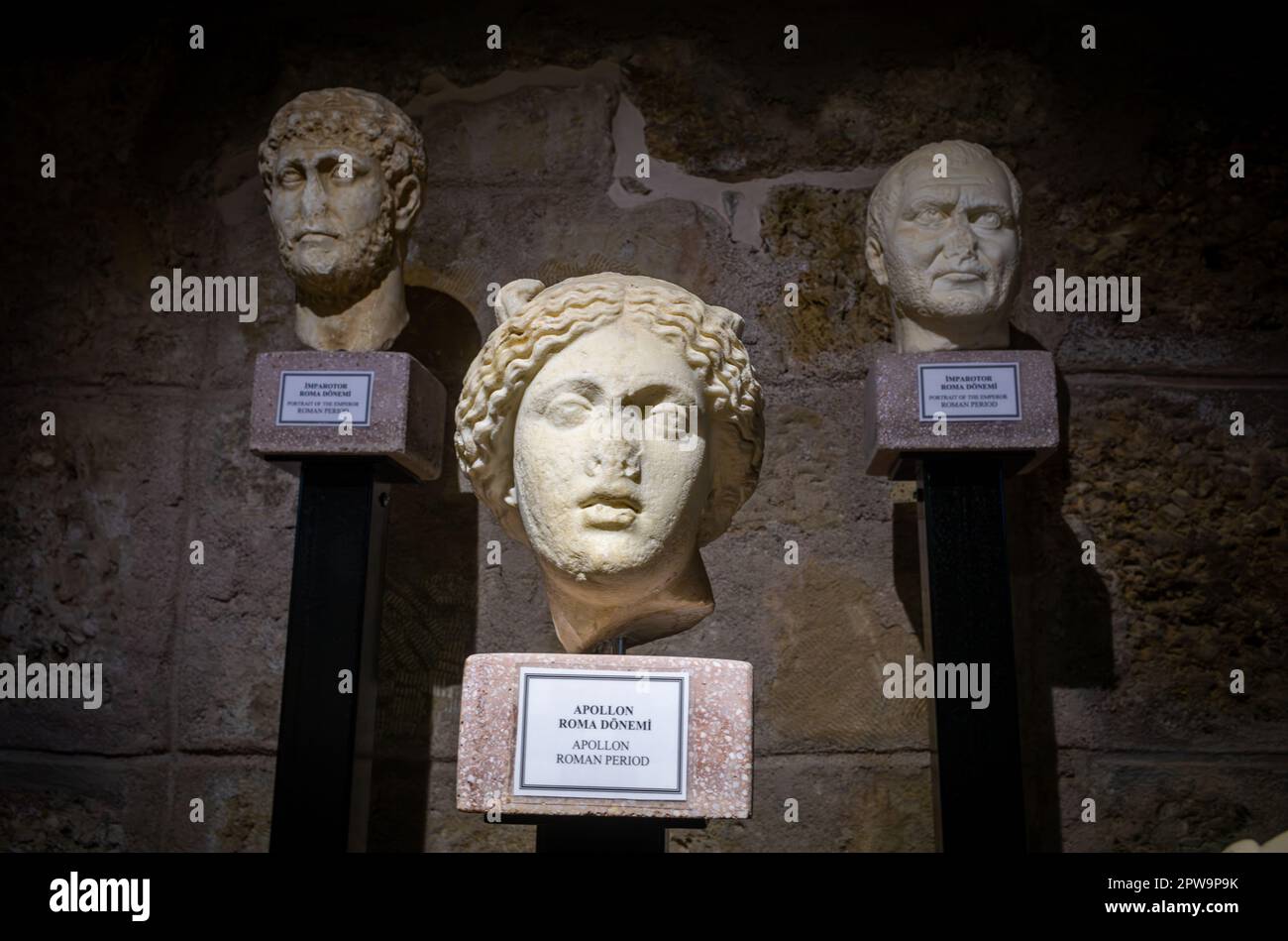Three carved stone marble Roman heads dating from 2nd - 4th century AD ...