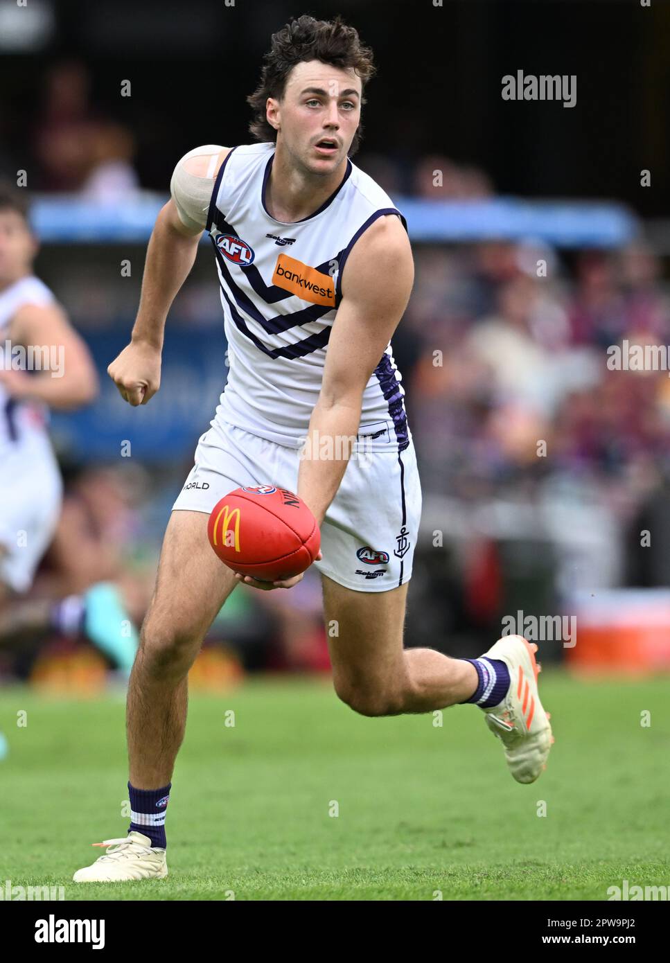 Jordan Clark of the Dockers in action during the AFL Round 7 match between the Brisbane Lions ...